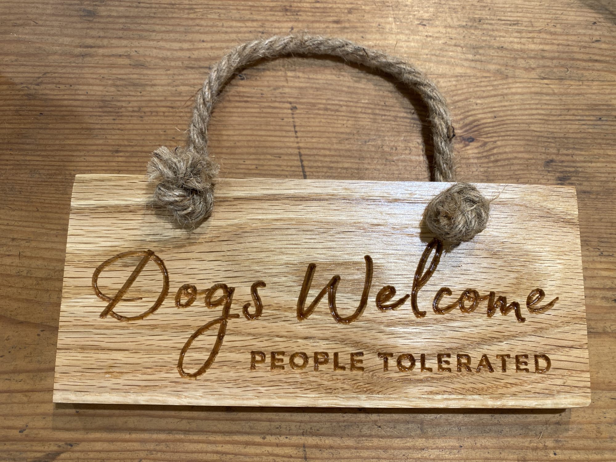 Engraved Oak Rope Hanging Sign - Dogs Welcome People Tolerated ...
